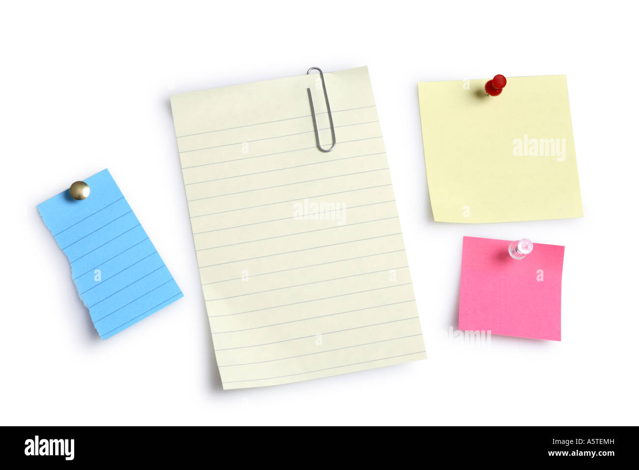 Notes with push pins and paperclips cut out on white background Stock ...