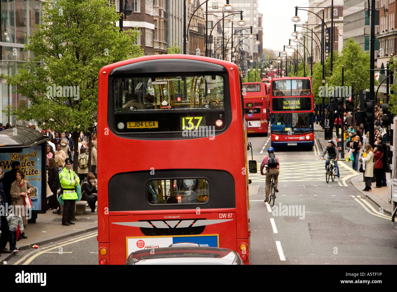 view of a red old style bus ride commute commuter London Britain UK ...