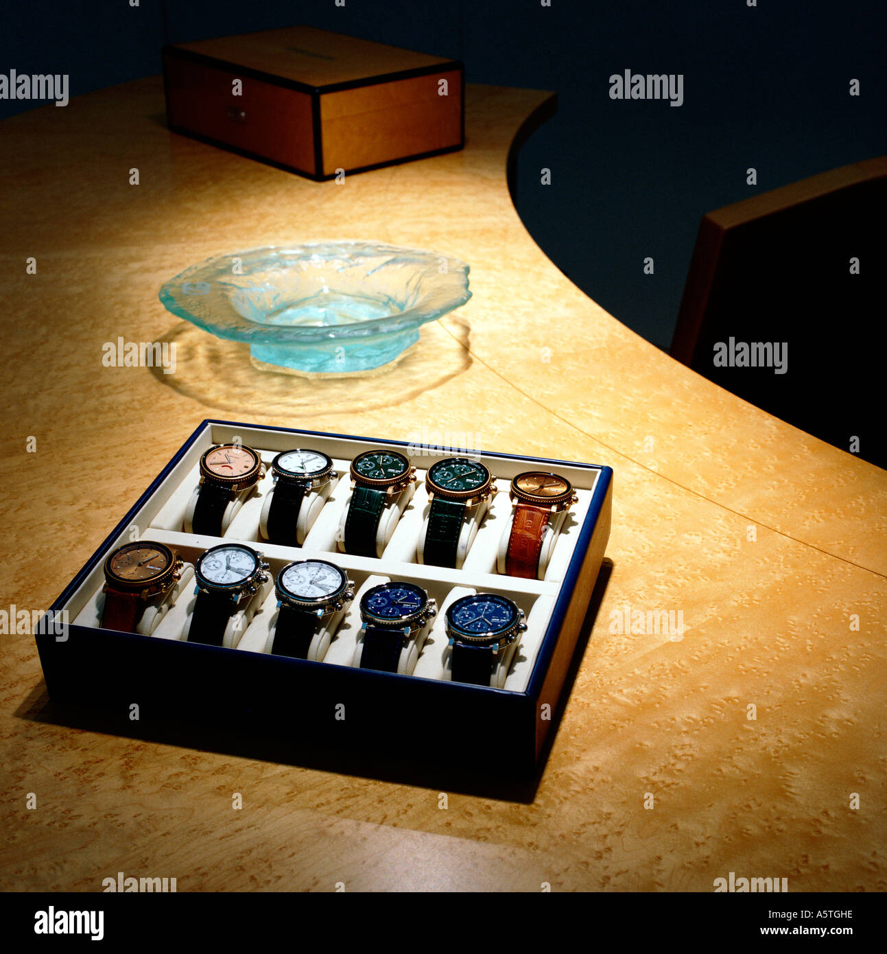 Luxury watches on display in a showroom Stock Photo - Alamy