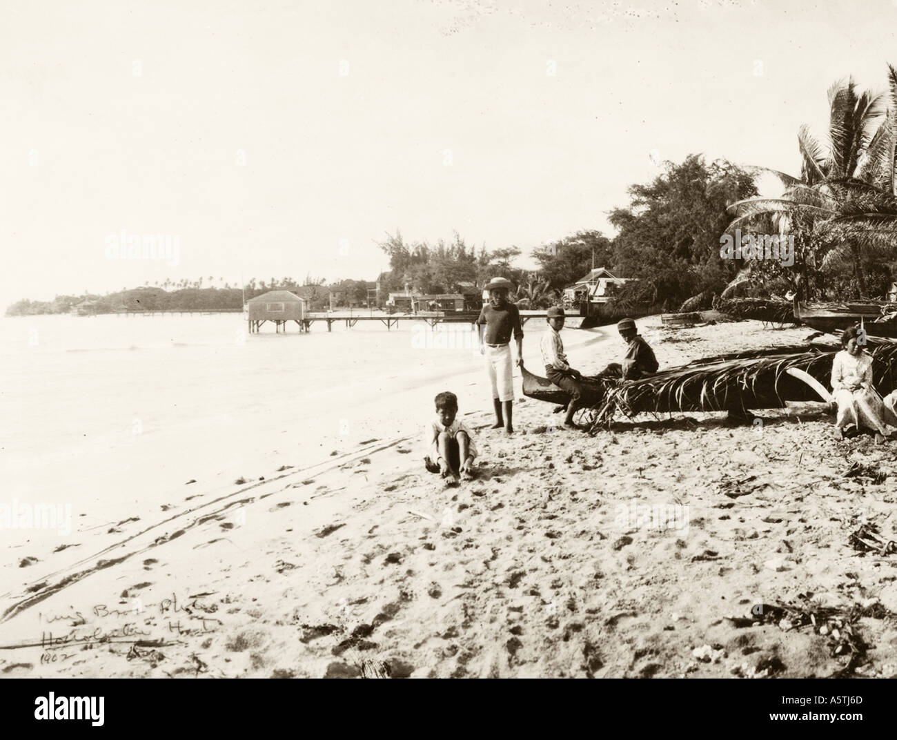 Old outrigger canoe on beach hi-res stock photography and images - Alamy