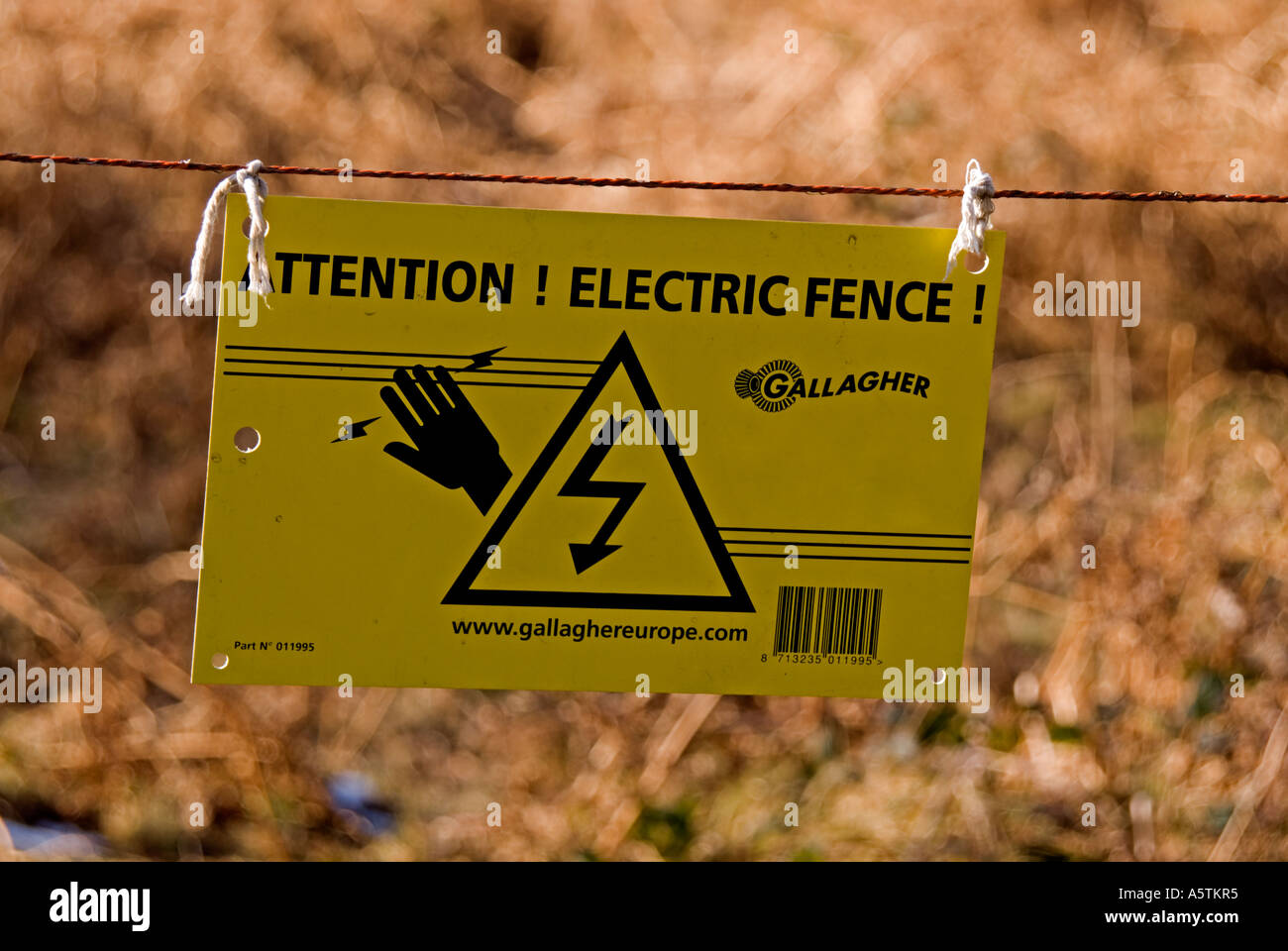 Electric fence sign Stock Photo - Alamy