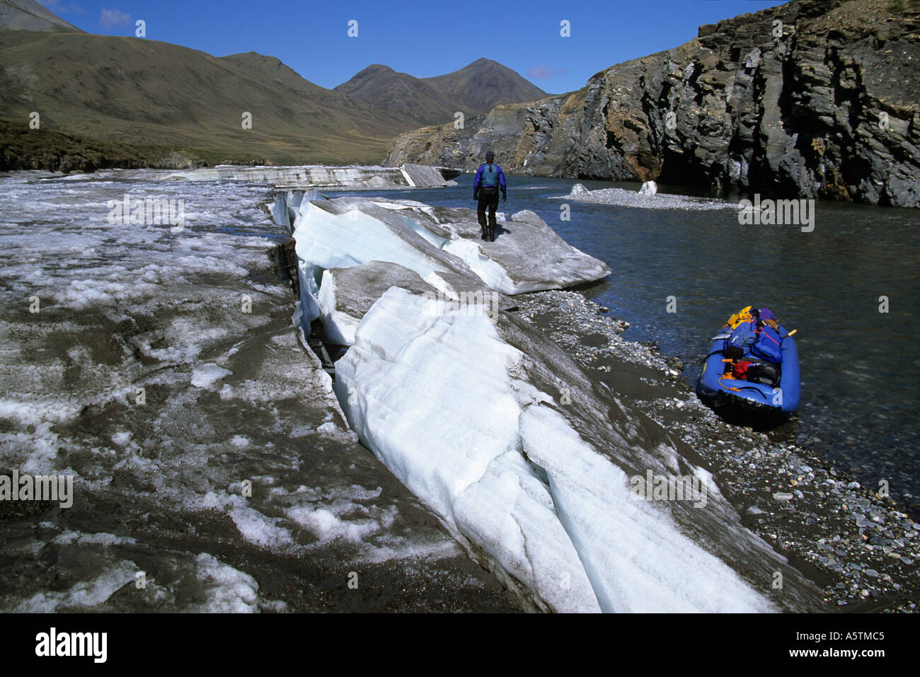 Alaska Arctic National Wildlife Refuge River ice with gravel on top ...