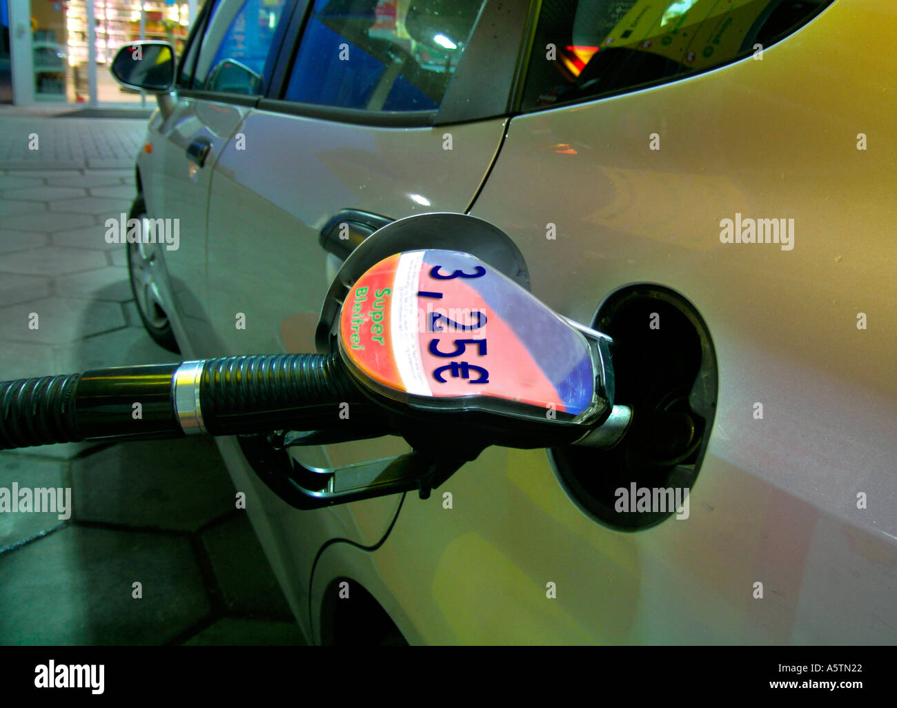 filling expensive fuel in a car at a filling station Stock Photo - Alamy