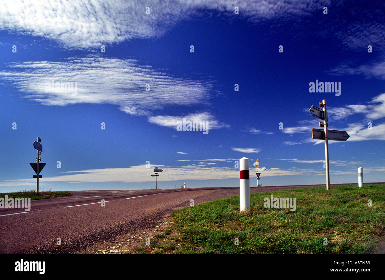 country road with signpost Stock Photo - Alamy