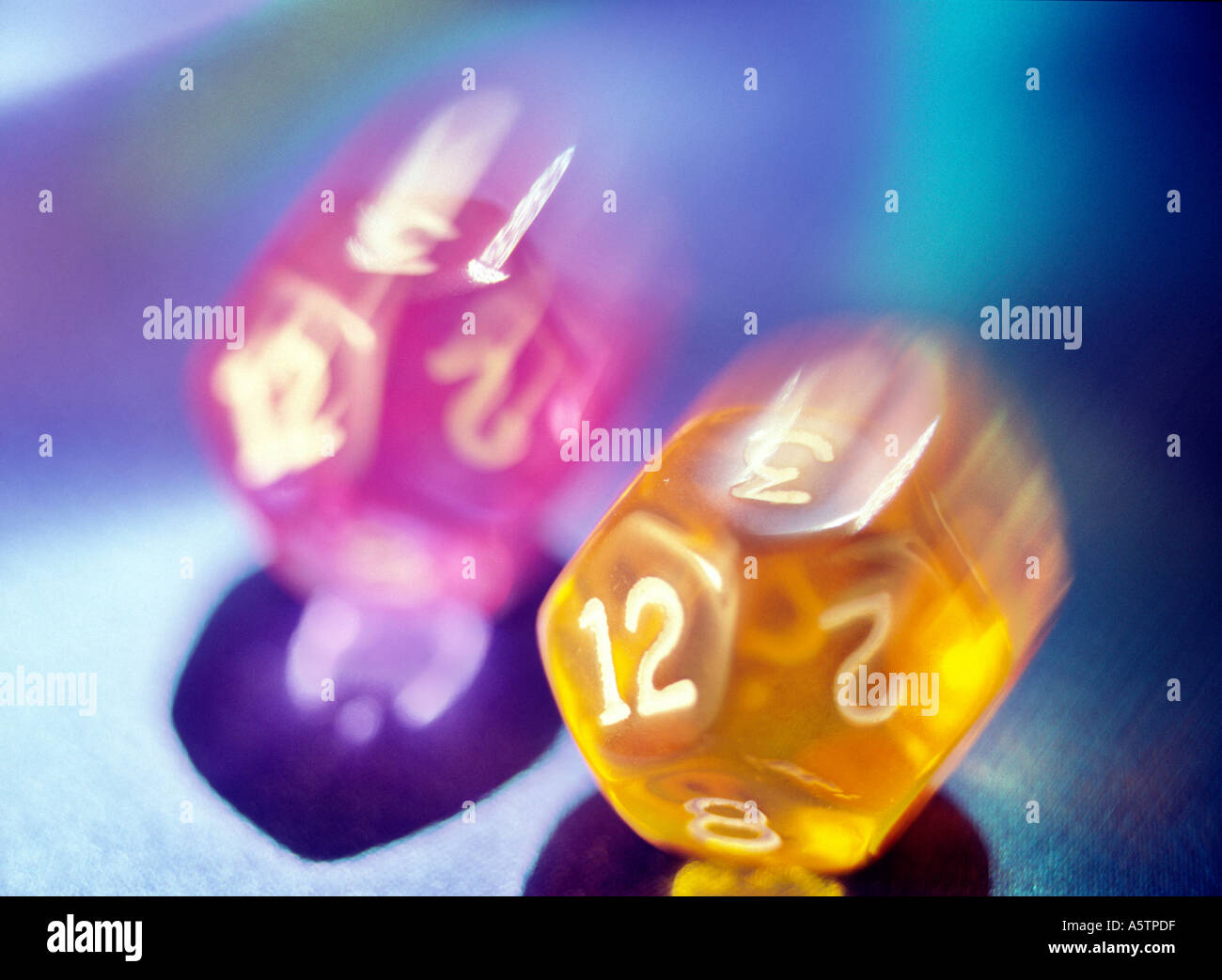 two transparent coloured dice Stock Photo - Alamy
