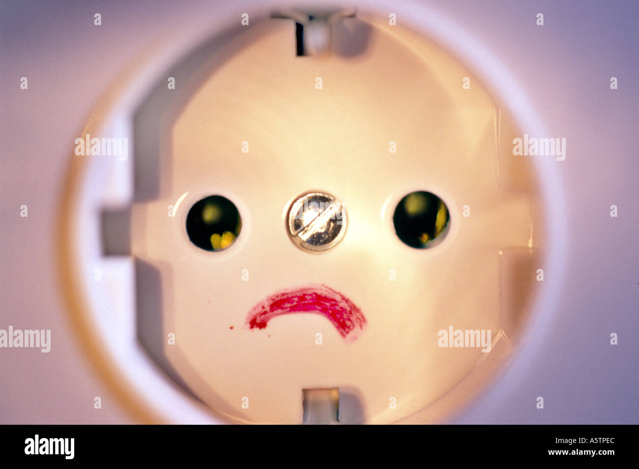 socket with a sad face Stock Photo - Alamy