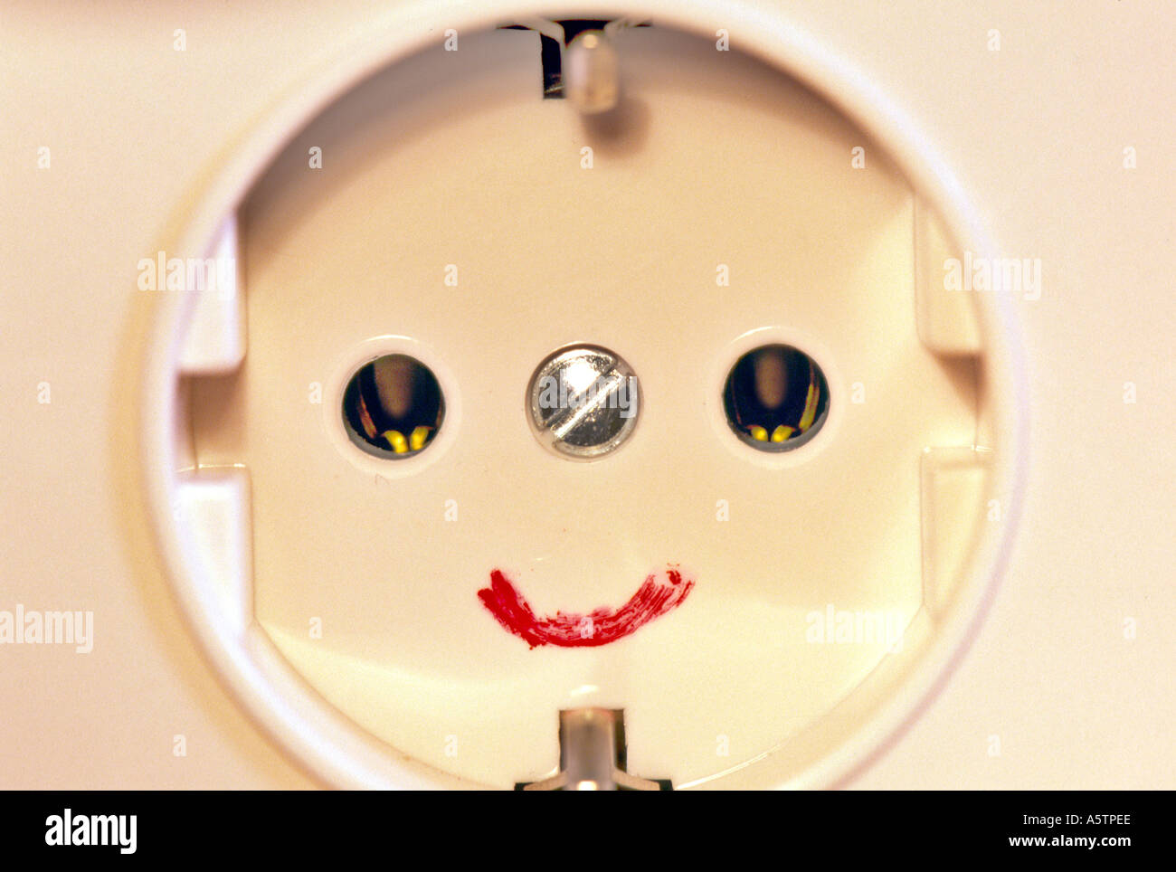 socket with a happy face Stock Photo - Alamy