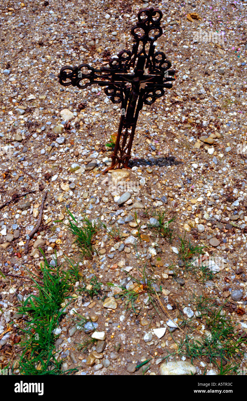 broken wrought iron cross in stony ground Stock Photo - Alamy