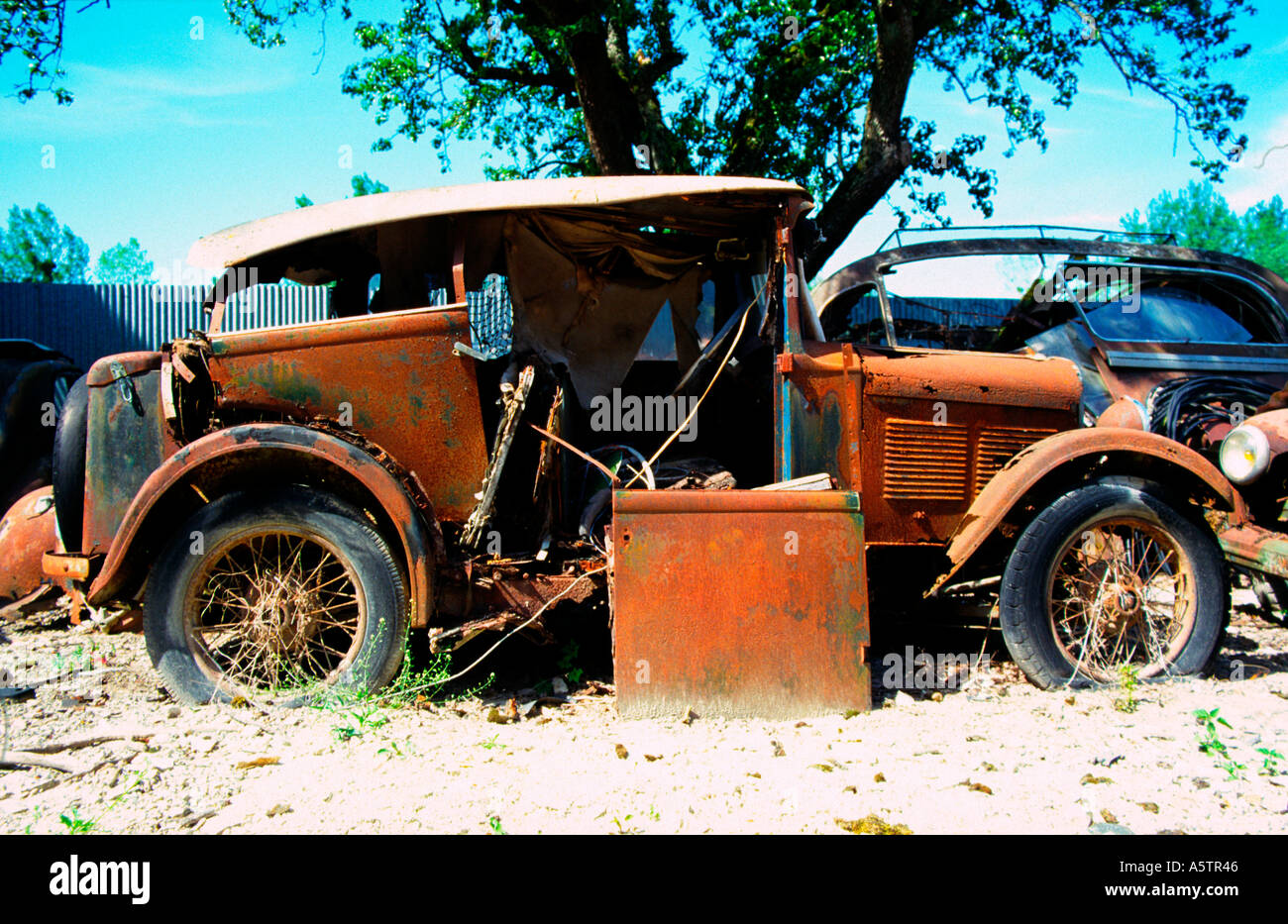 rusted wreck of oldtimer car Stock Photo - Alamy