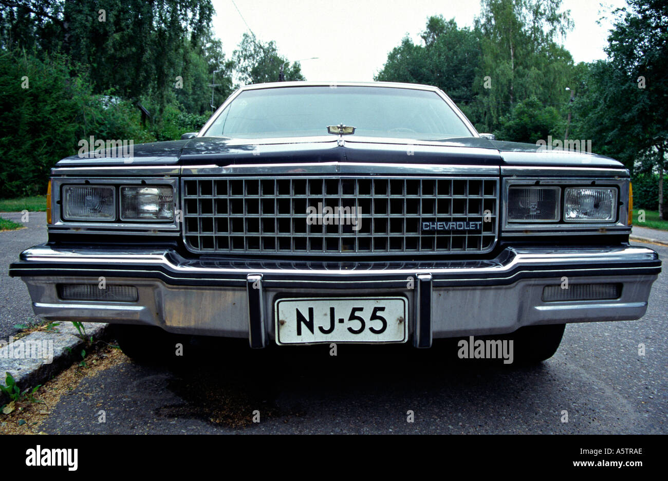 front of a big american oldtimer car Chevrolet Stock Photo - Alamy