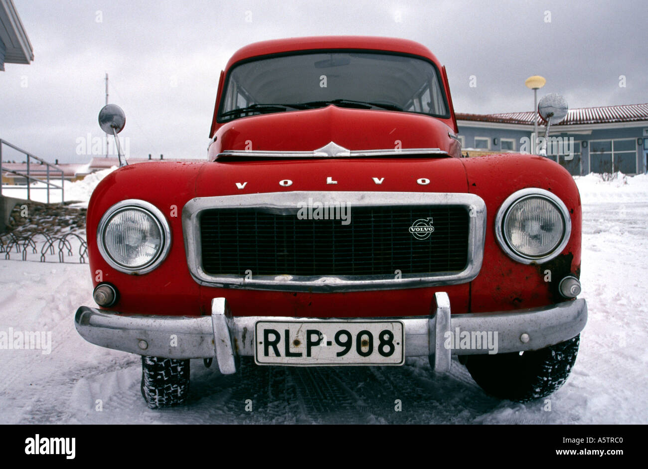 red oldtimer Volvo in snow Stock Photo - Alamy
