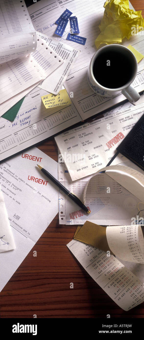 Messy Business Office Desk With Papers, Cofee Mug And Pen Stock Photo ...