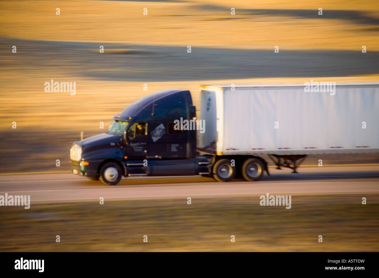 Semi truck speeding on Interstate 80, United States Stock Photo - Alamy Semi truck speeding on Interstate 80, United States Stock Photo - Alamy