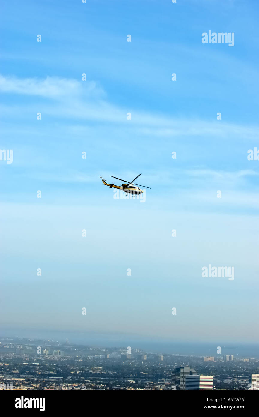Helicopter flying over Los Angeles Stock Photo - Alamy