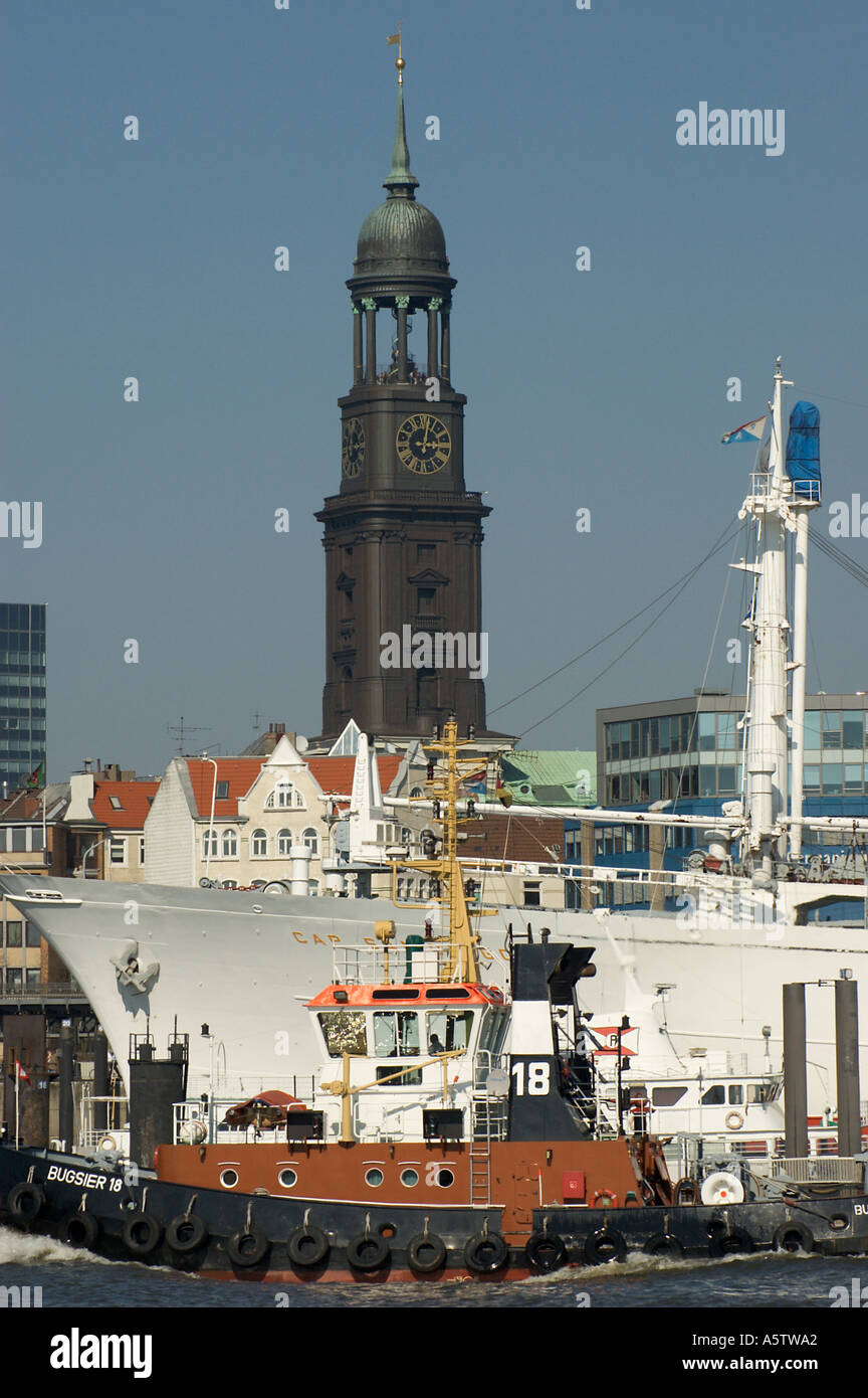 Tower of St Michaelis church and shipping traffic at Hamburg Harbour ...