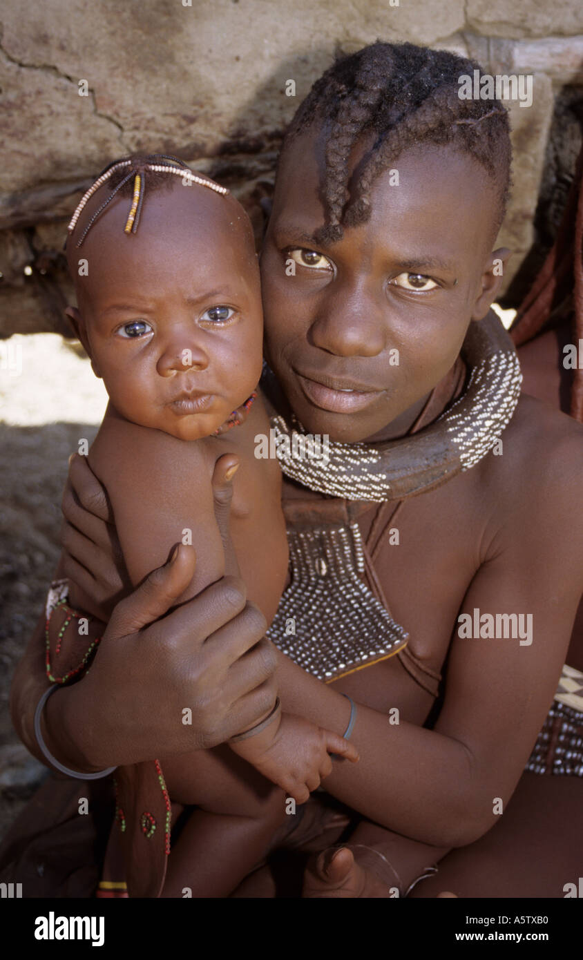 Himbagirl With Baby Mother With 12 13 Years Nomads In Namibia Stock Himbagirl With Baby Mother With 12 13 Years Nomads In Namibia Stock