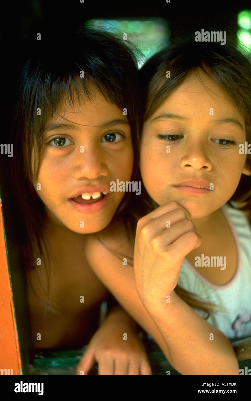 Painet hl1840 playfull cute girls posing for photographer island ...