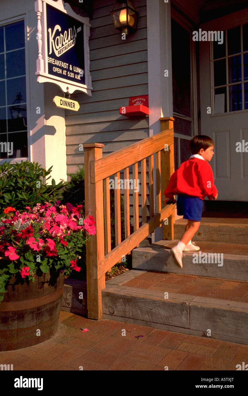 Kid climbing stairs hi-res stock photography and images - Alamy