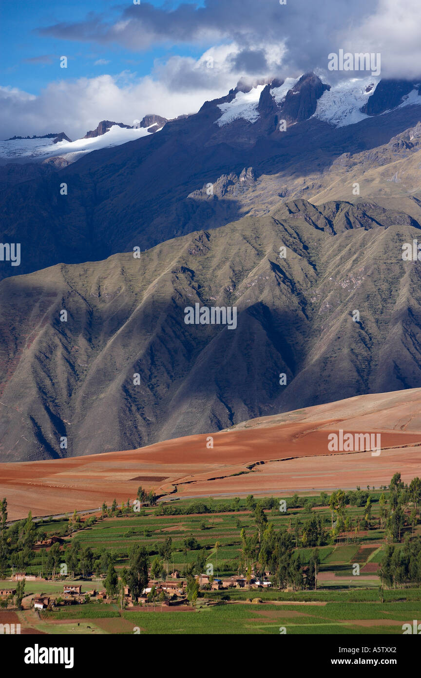 farmland above the Sacred Valley with the Urubamba Cordillera of the ...