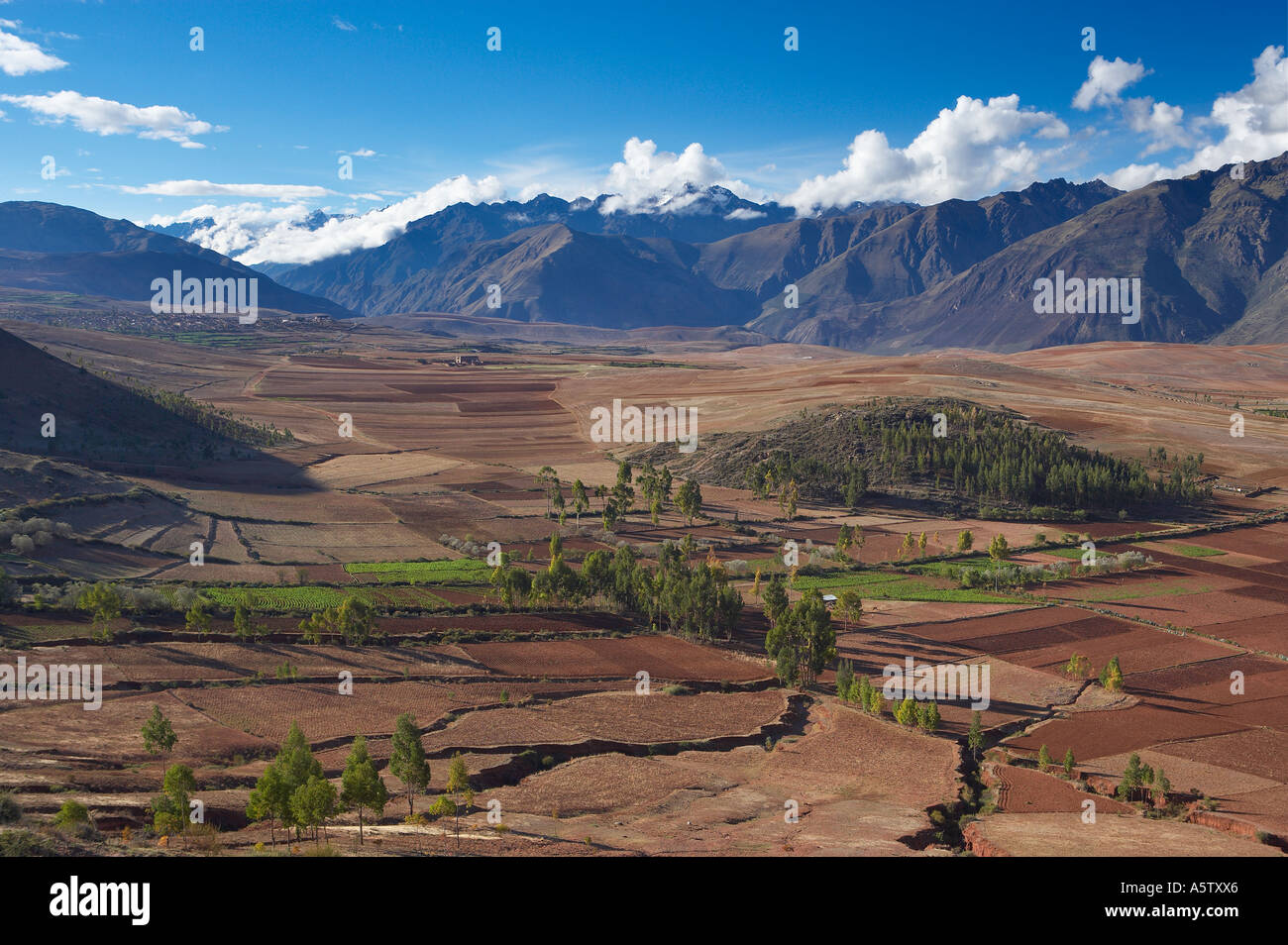 farmland above the Sacred Valley with the Urubamba Cordillera of the ...