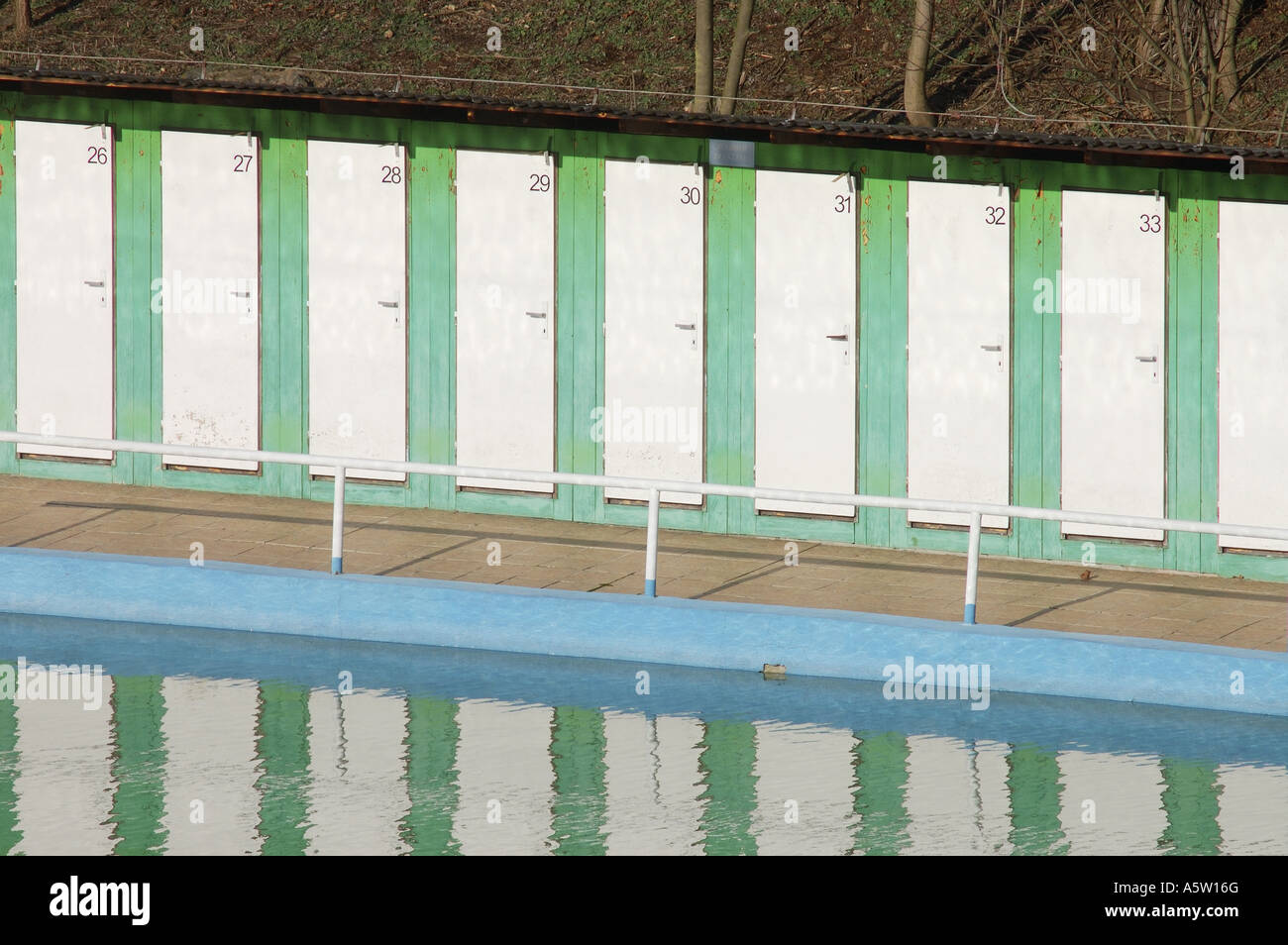 row of changing boxes by swimming pool Stock Photo - Alamy