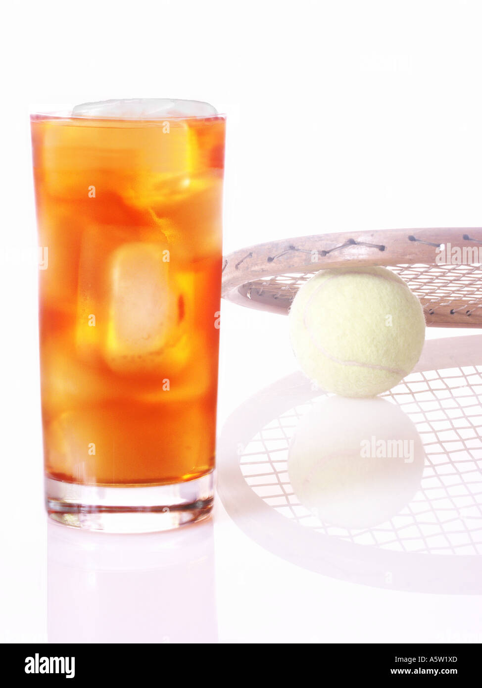 Tennis racquet and ball with a glass of iced tea Stock Photo - Alamy