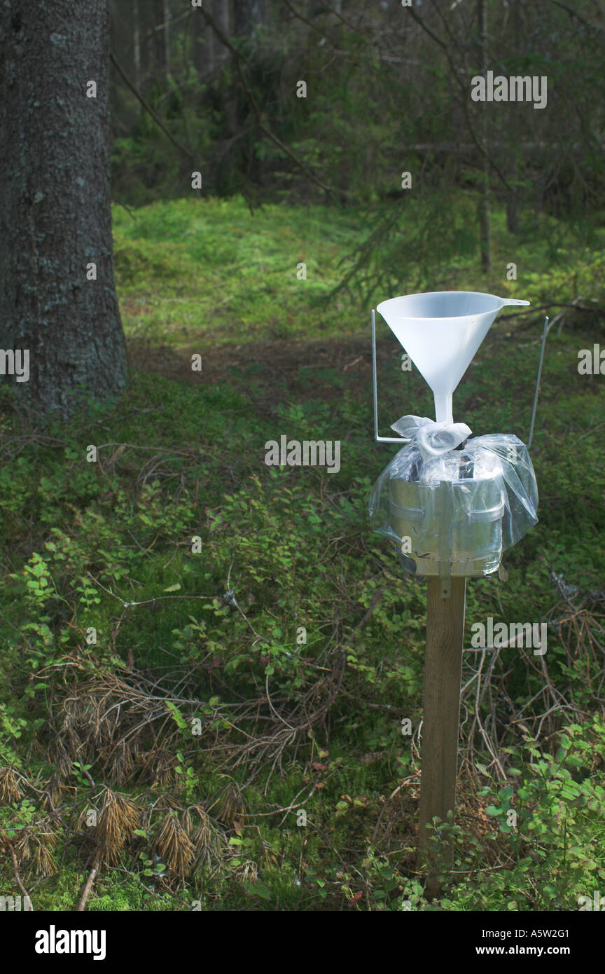 Plastic container collects the rain water directly from the air Stock ...