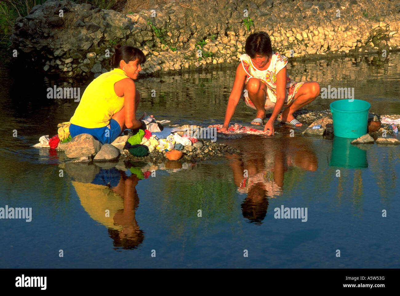 Filipino Women Washing High Resolution Stock Photography and Images - Alamy