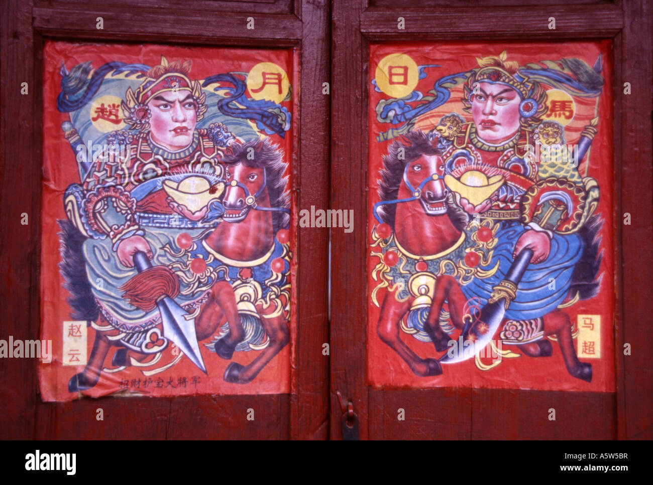 Traditional chinese new year posters on a rural house doorway,Dali ...