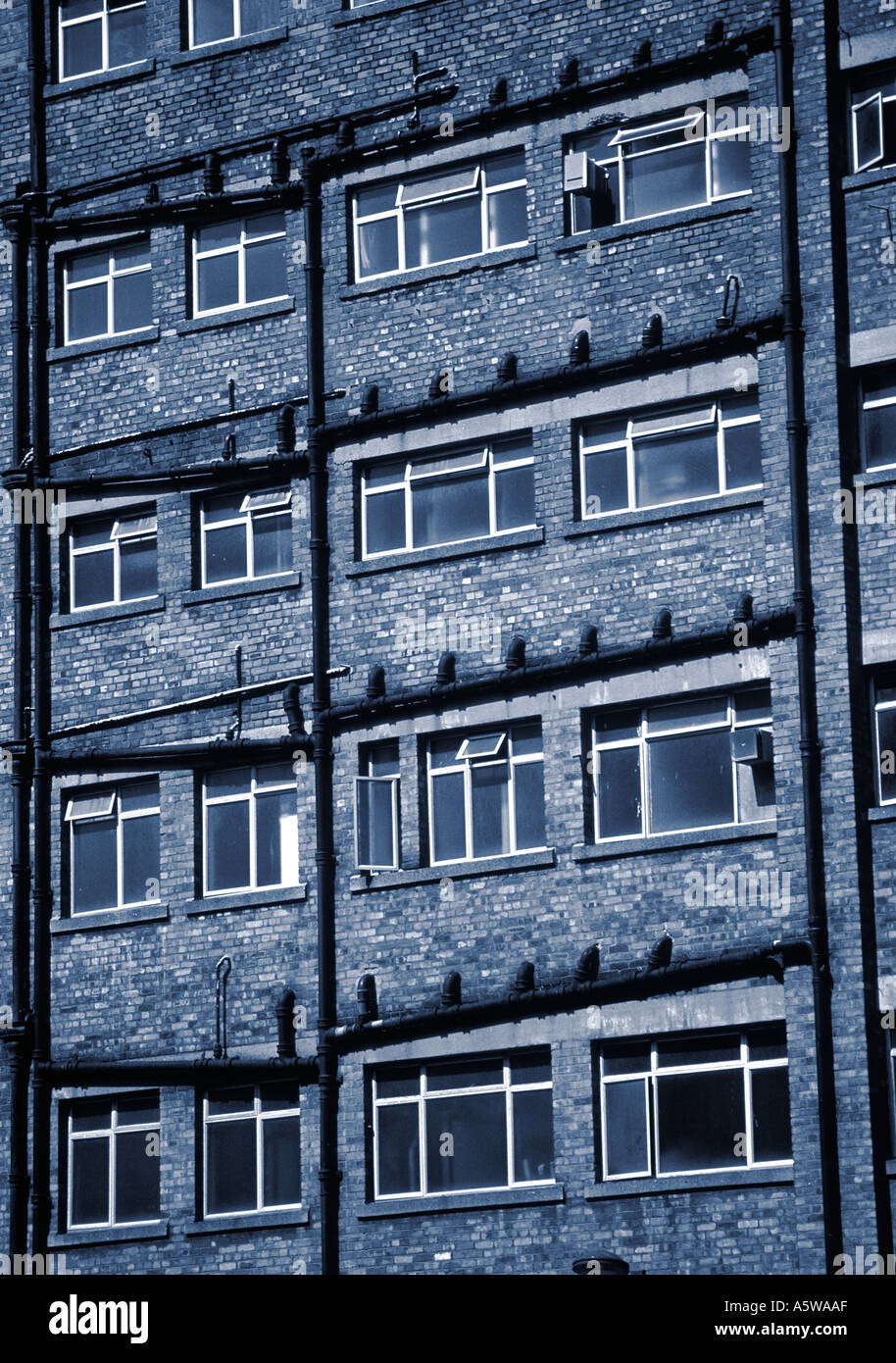 Typical utlitarian facade to a 1970s building Stock Photo - Alamy