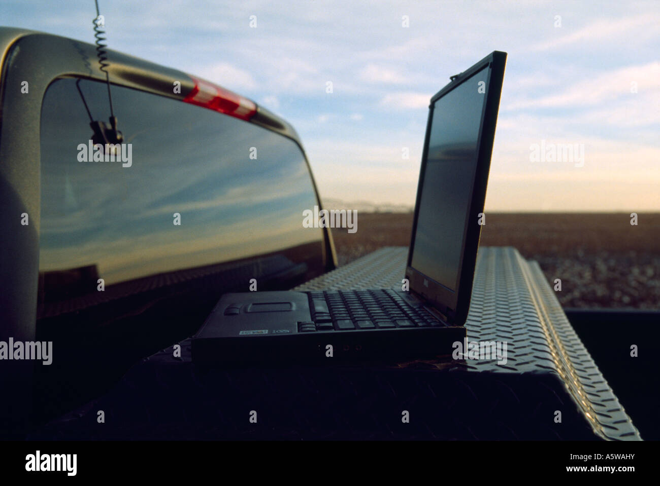 MODERN TOOLS, SUCH AS LAPTOP COMPUTER AND MOBILE PHONE USED IN COTTON ...