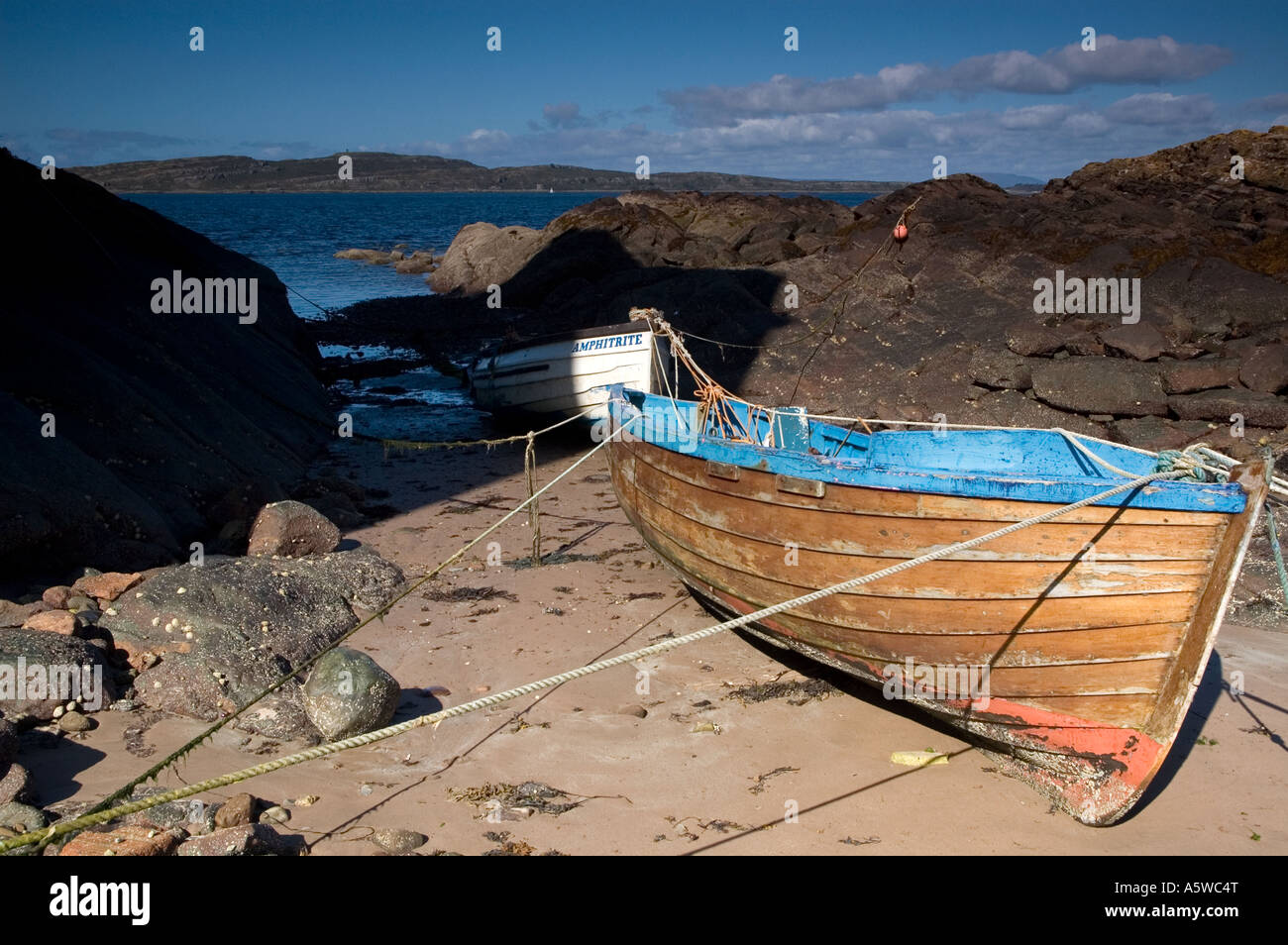 A boat docked on the small slipway at Portencross castle Stock Photo ...