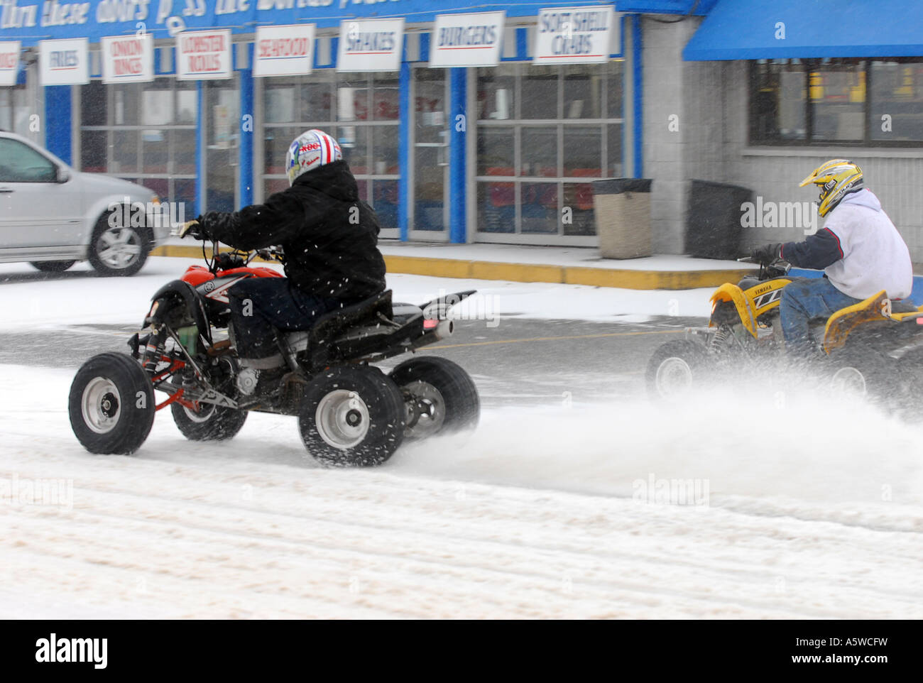 People riding terrain vehicles hi-res stock photography and images - Alamy