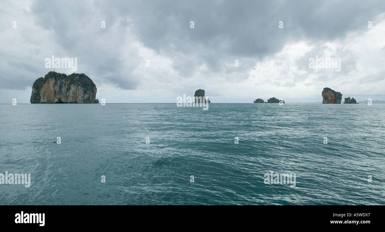 Limestone rock formations rising above the Andaman Sea Southern ...