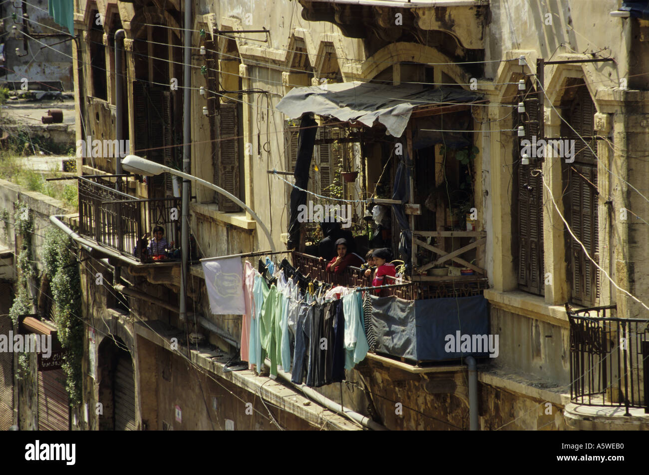 Washing line on the balcony of damaged apartments, Beirut, Lebanon ...