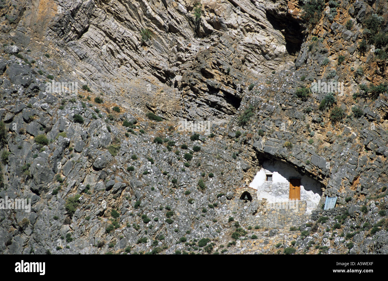 Chapel cut into rock, Crete Stock Photo - Alamy