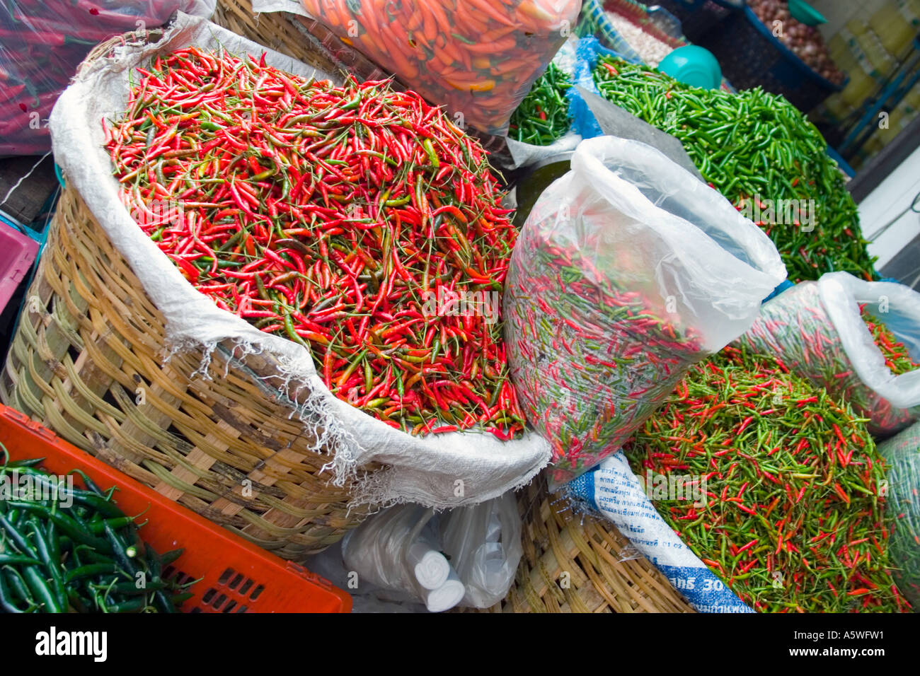 Baskets of Chilli Peppers Street market Thailand Stock Photo - Alamy