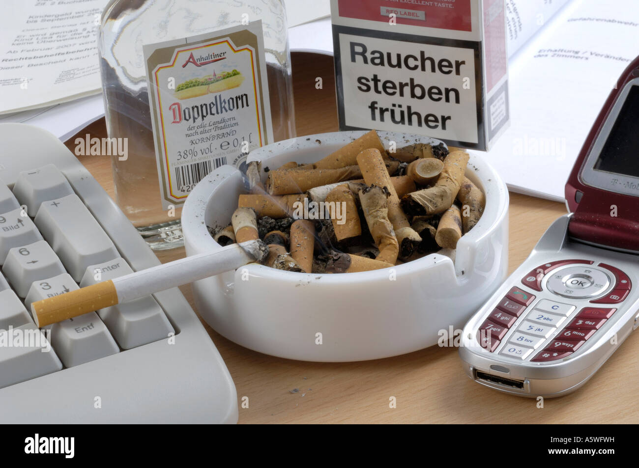 Ashtray on desk Stock Photo - Alamy