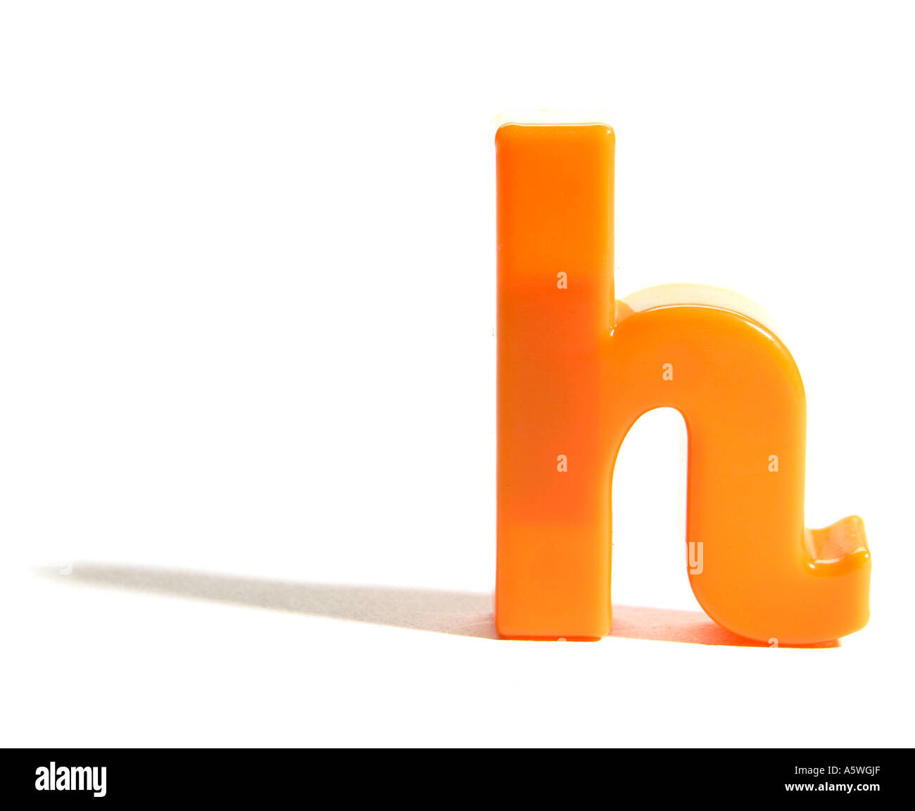 an orange fridge magnet letter h Stock Photo - Alamy