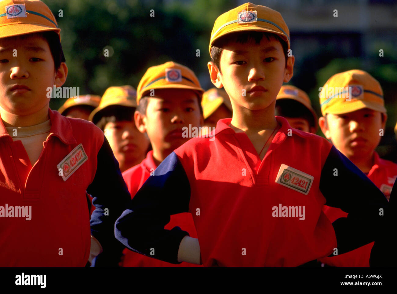 Line up of children hi-res stock photography and images - Alamy