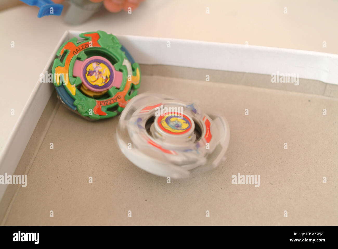 boys plays with beyblade Stock Photo - Alamy