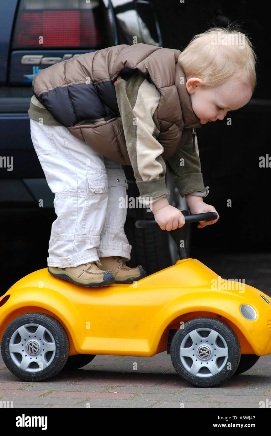 child plays with bobby car Stock Photo - Alamy