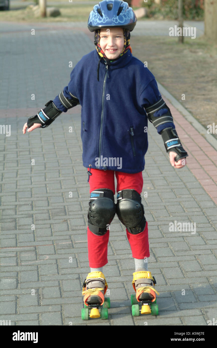 child with inline skates Stock Photo - Alamy