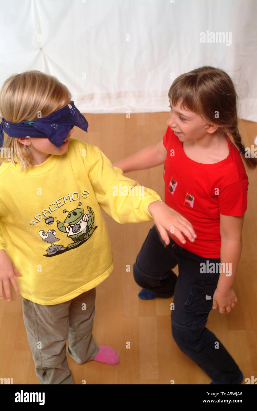 Children frolicking hi-res stock photography and images - Alamy