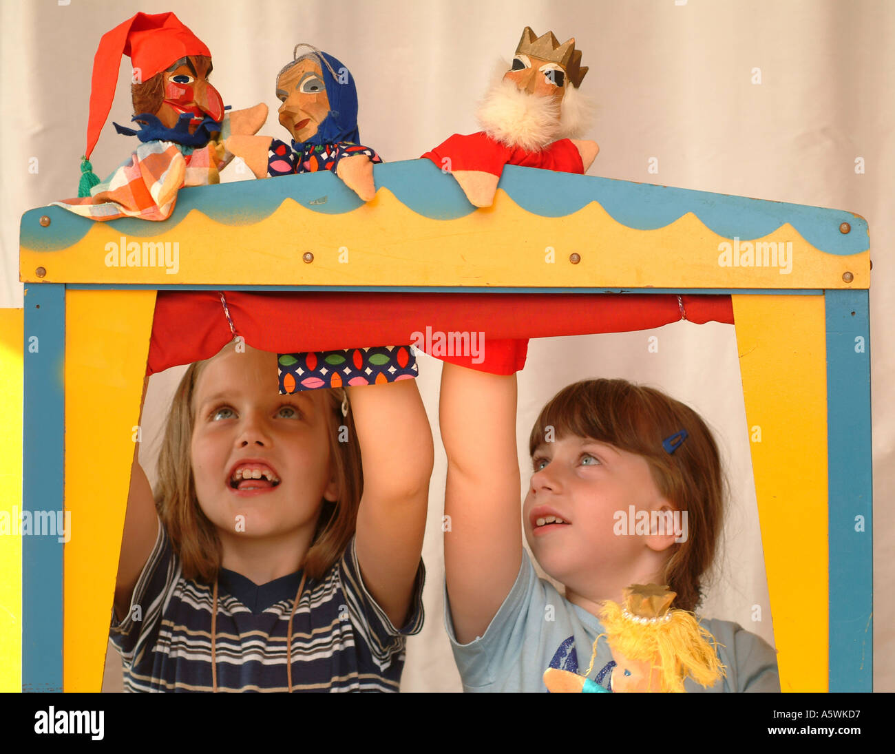 children plays with hand puppet Stock Photo - Alamy