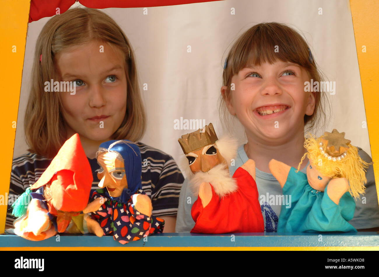 children plays with hand puppet Stock Photo - Alamy