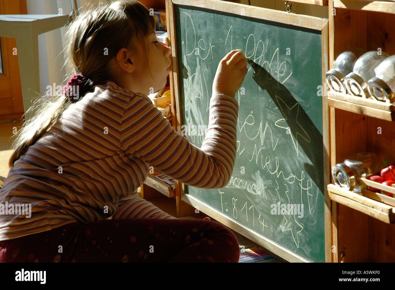 Child paints chalk hi-res stock photography and images - Alamy