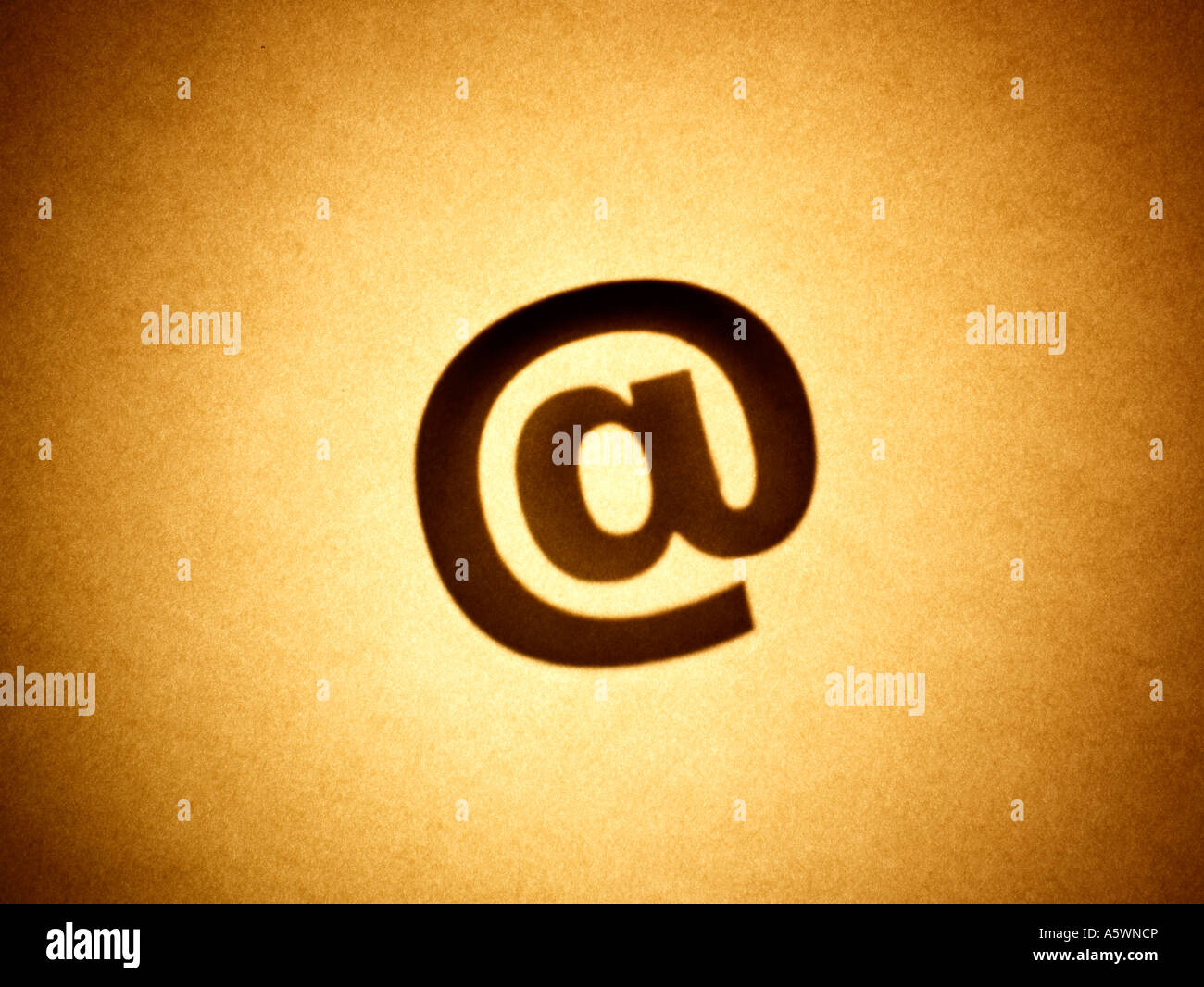 At Symbol @ silhouette Stock Photo - Alamy