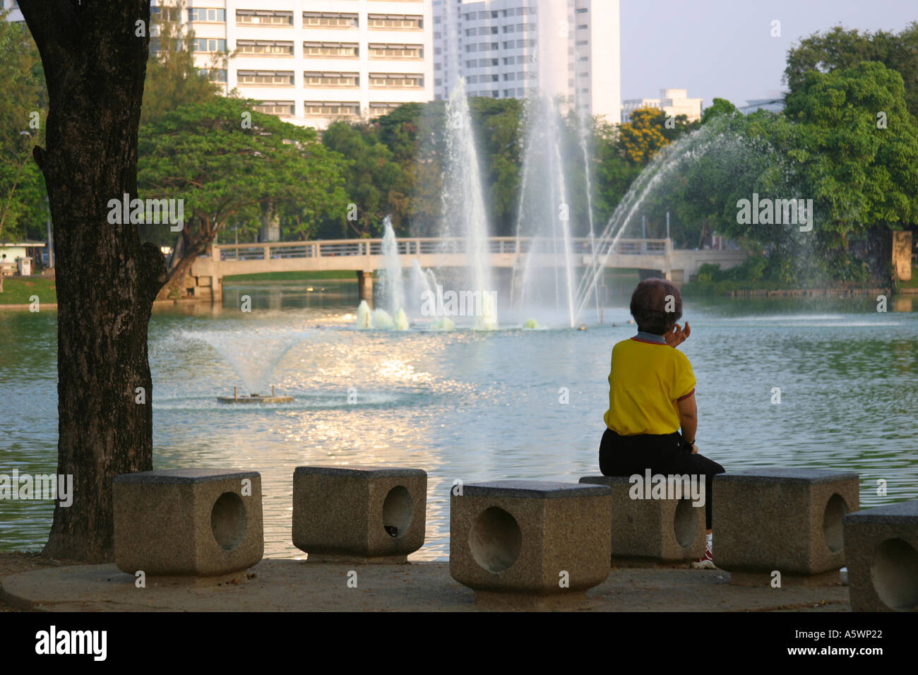 Relaxing at Lumphini parc Bangkok Stock Photo - Alamy
