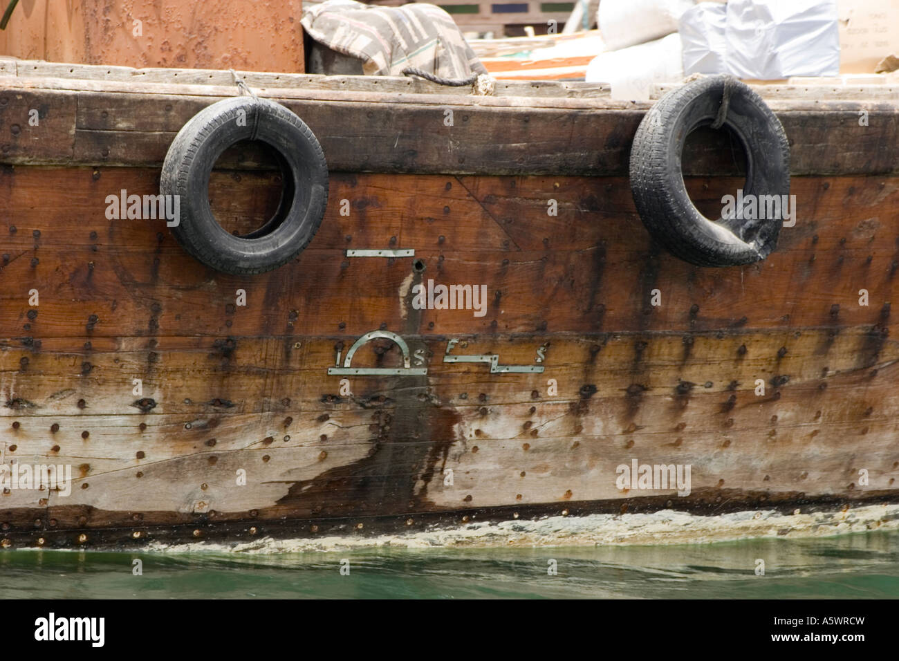 Dhow hull showing Plimsoll line in Dubai Stock Photo - Alamy